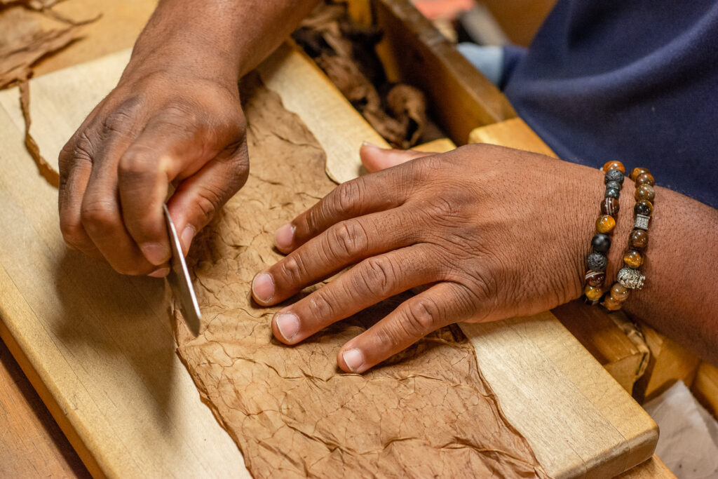 How many hands touch a cigar during its production? - Bobalu Cigar Company